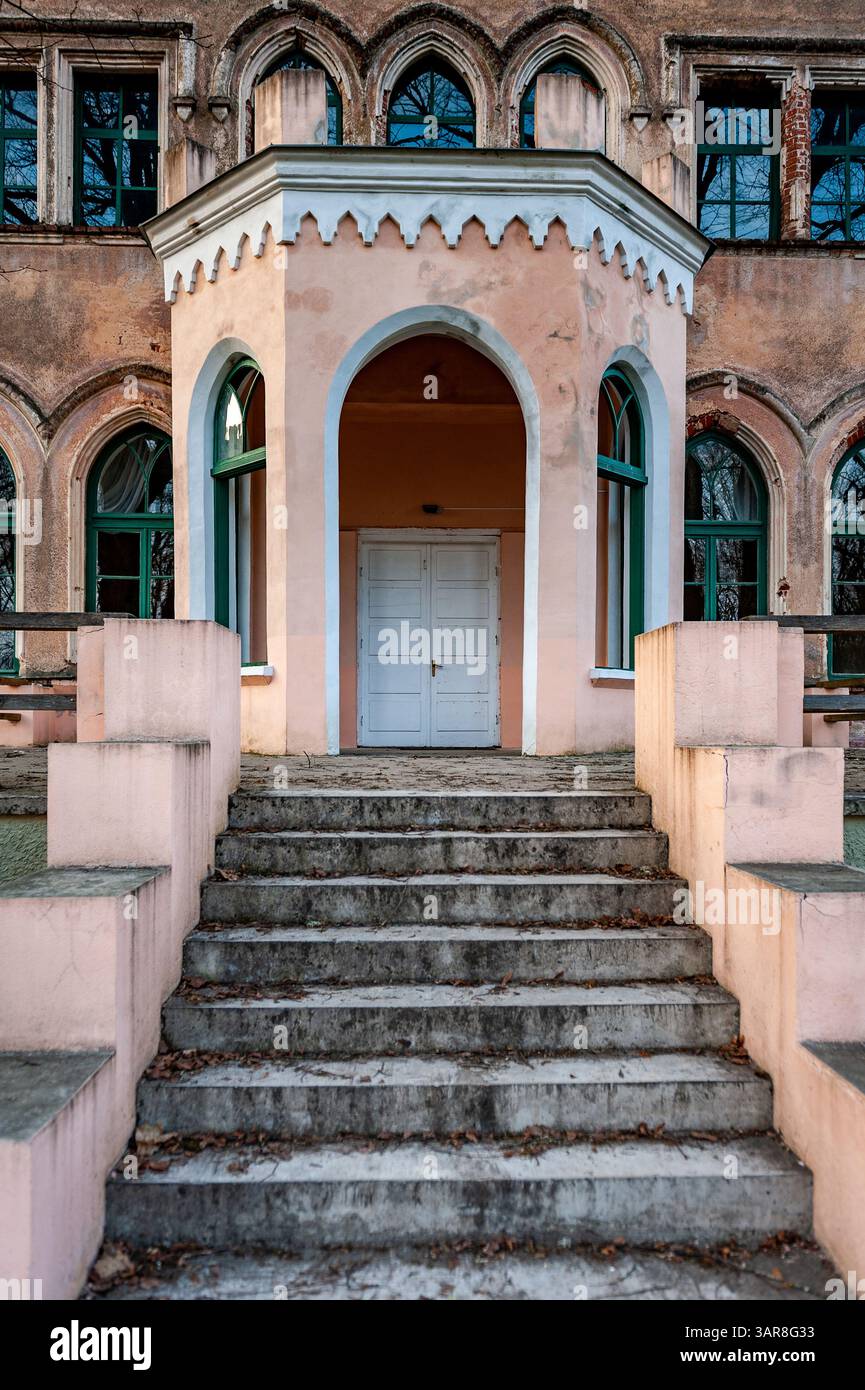 Large, elegant Odziena Manor, a castle built in the neo-Gothic style ...