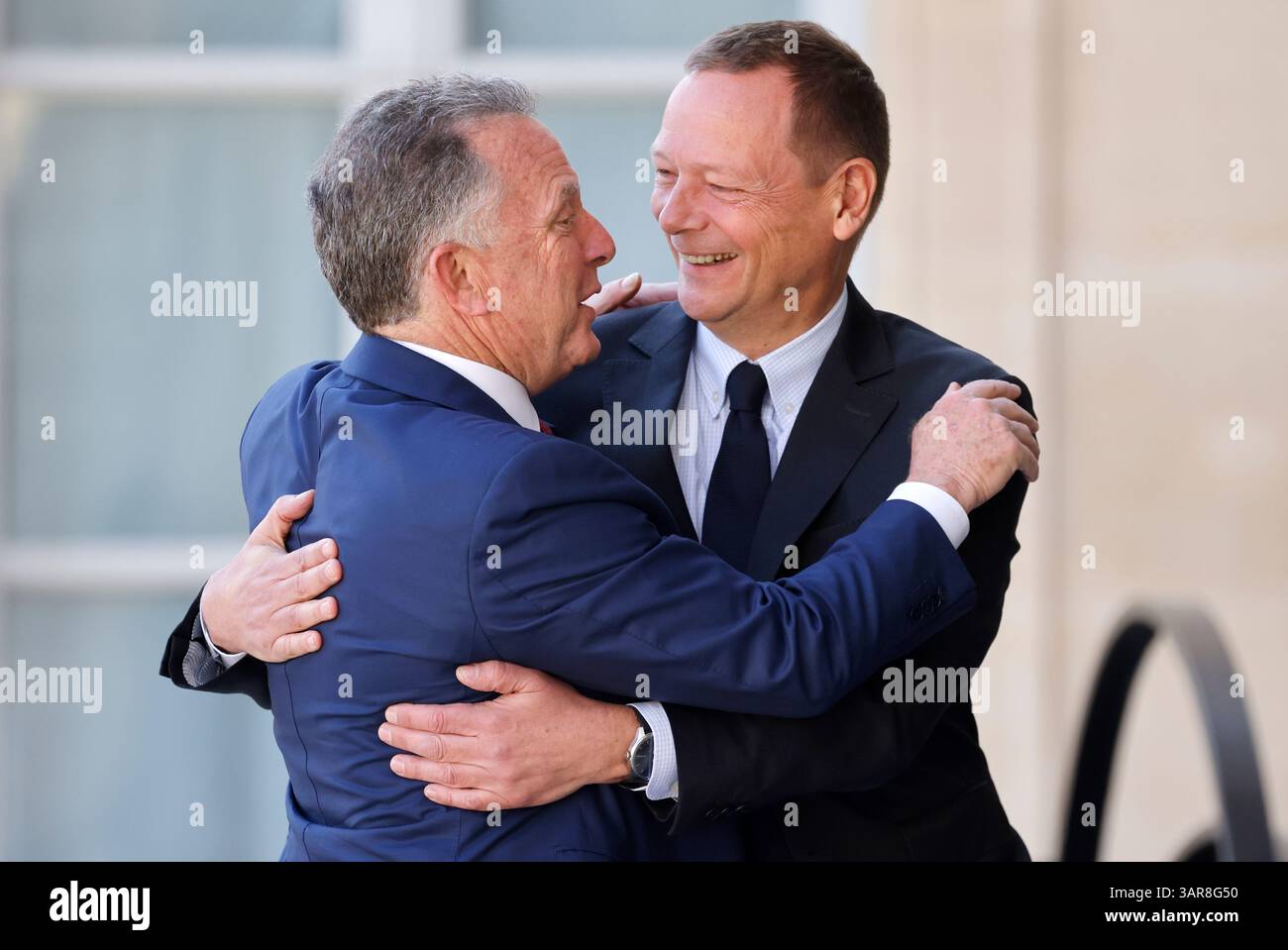 U.S. Special Envoy Steve Witkoff, left, is welcomed by French President ...