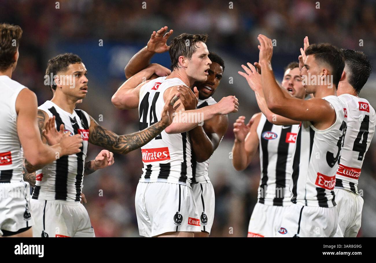 Brisbane, Australia. 17th Apr, 2025. Ned Long of the Magpies (centre ...