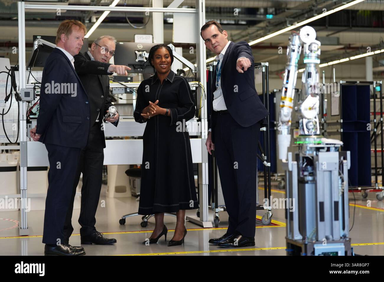 Conservative party leader Kemi Badenoch with Paul Bristow (left), Luke ...