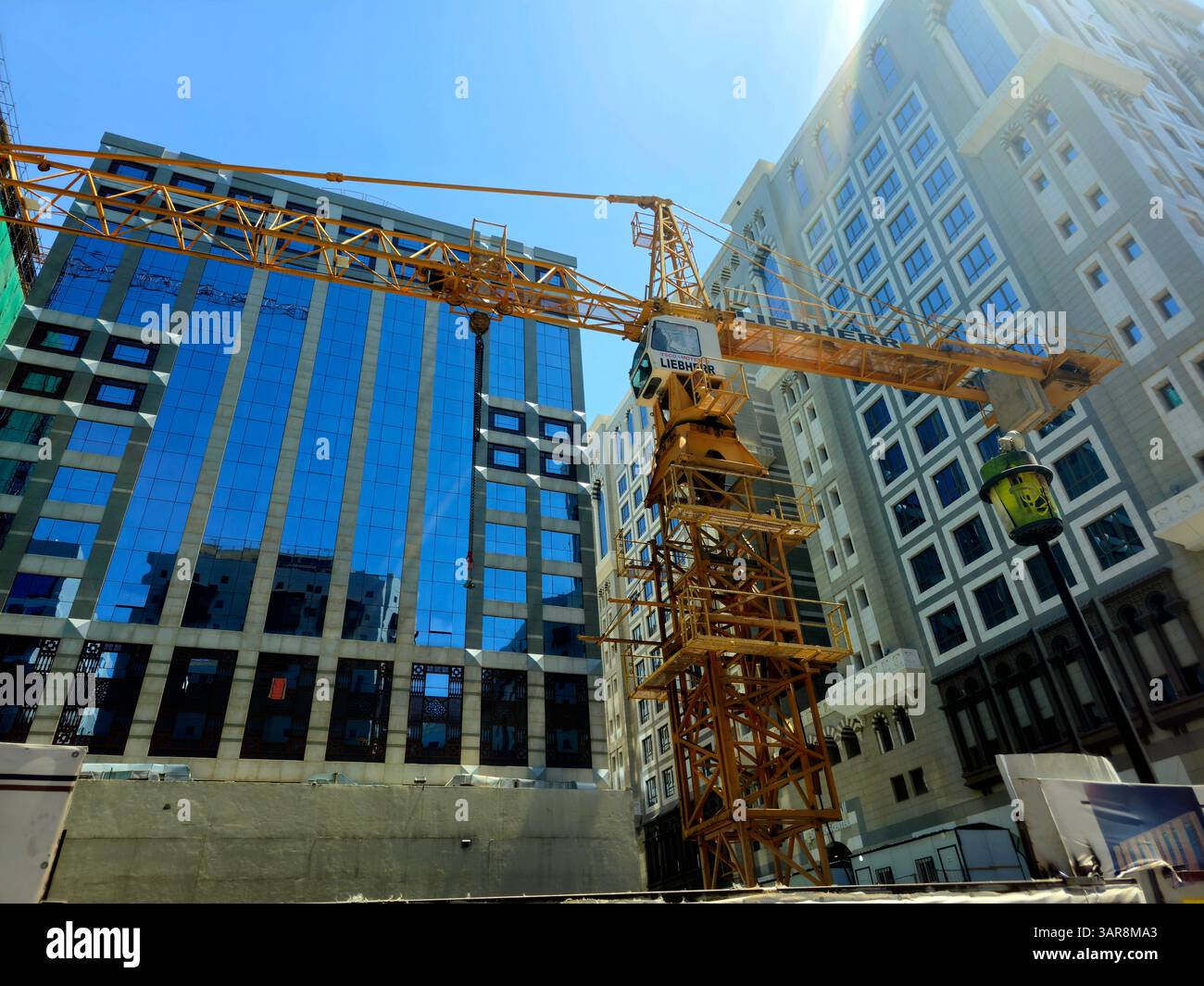 Medina, Saudi Arabia, June 28 2024: Crane at construction site of a new ...