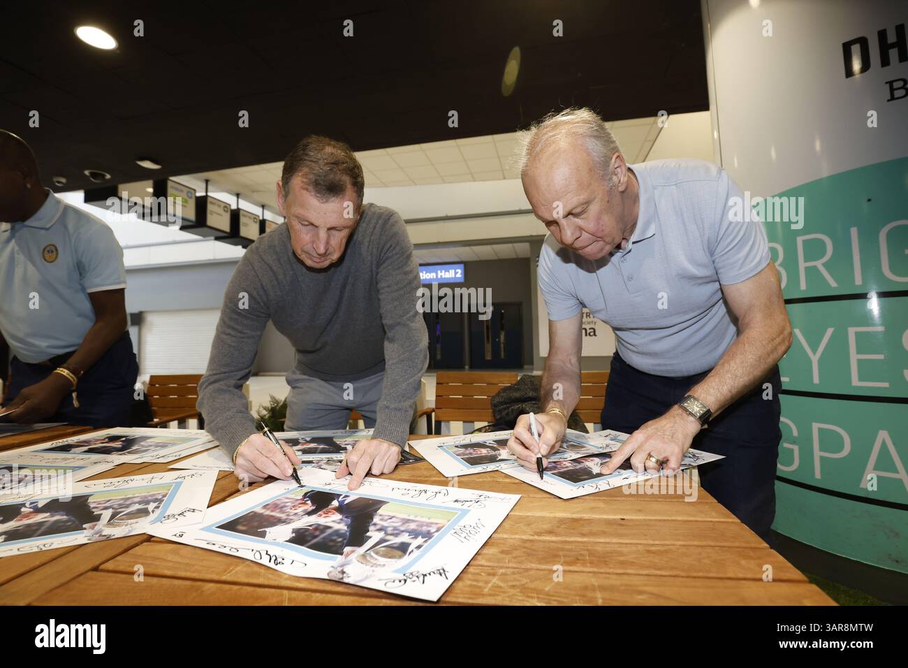 Former Coventry City player Keith Houchen signs prints during the ...