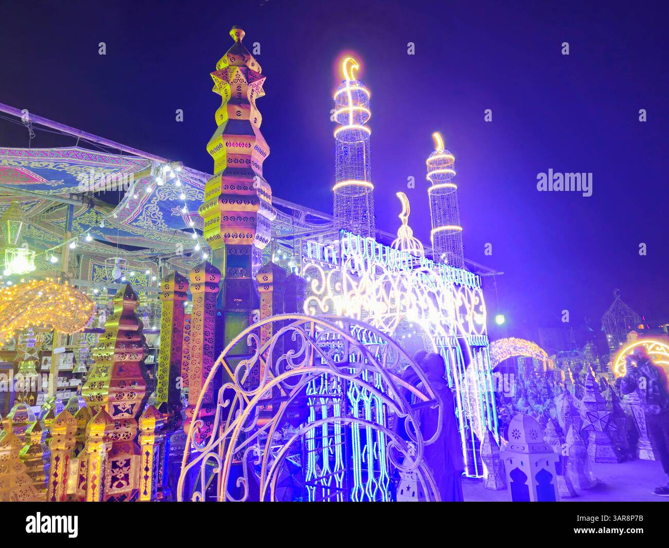 Cairo, Egypt, March 21 2025: Ramadan mosque shape with minarets as a festive decorations of ...