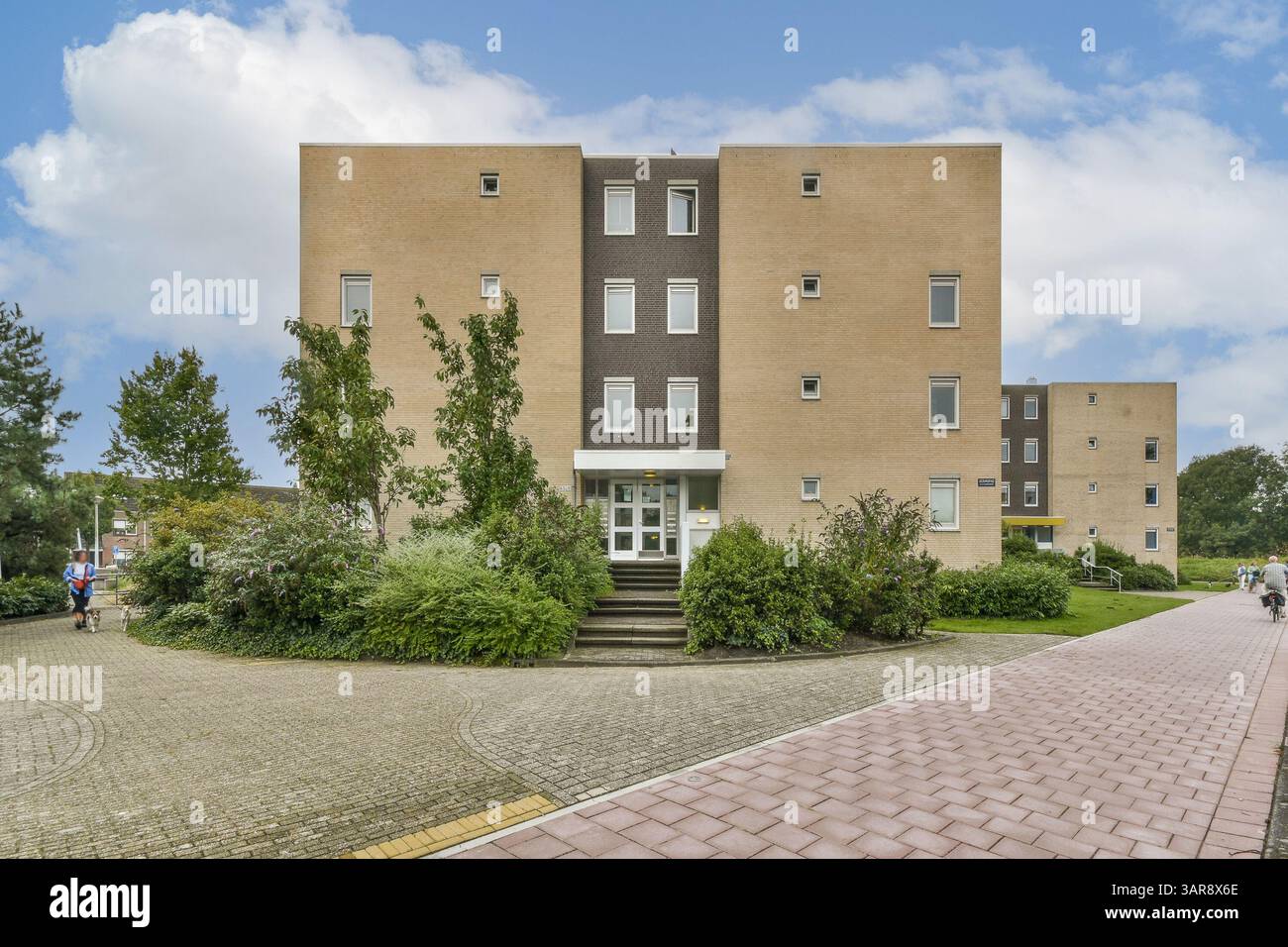 Showcases a contemporary architectural design of a building with lush ...