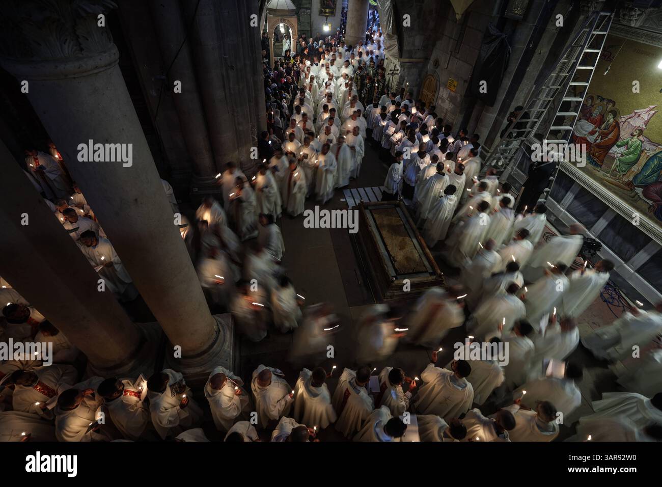 Washing of the Feet ceremony Christian monks and friars walk in procession around the Stone of ...