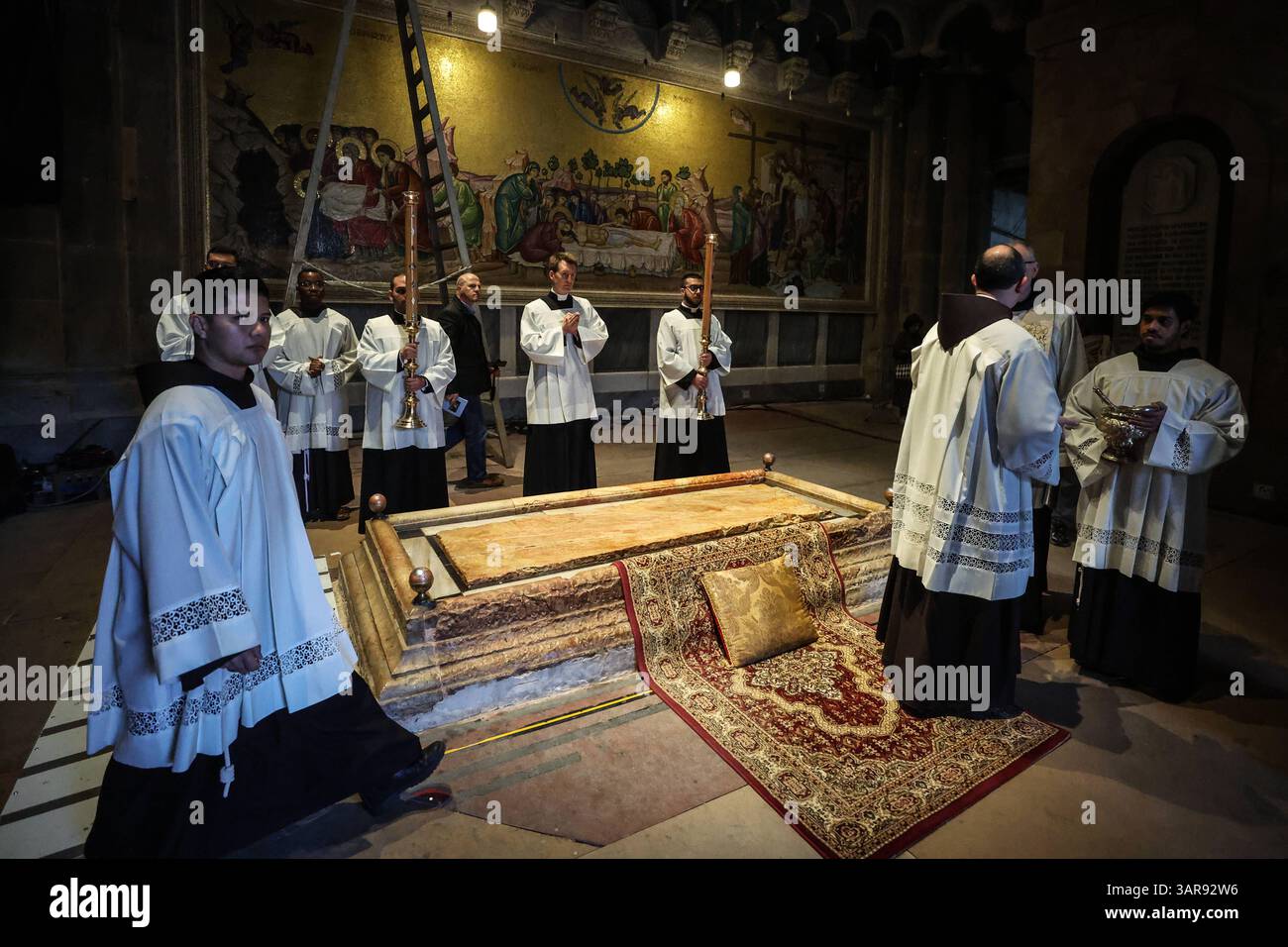 Washing of the Feet ceremony Christian worshippers pray at the Stone of ...