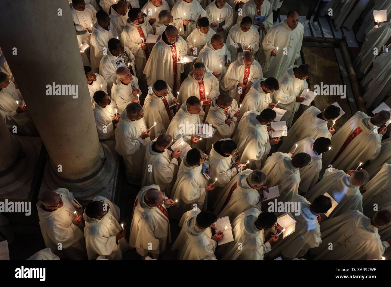Washing of the Feet ceremony Christian monks and friars walk in procession around the Stone of ...