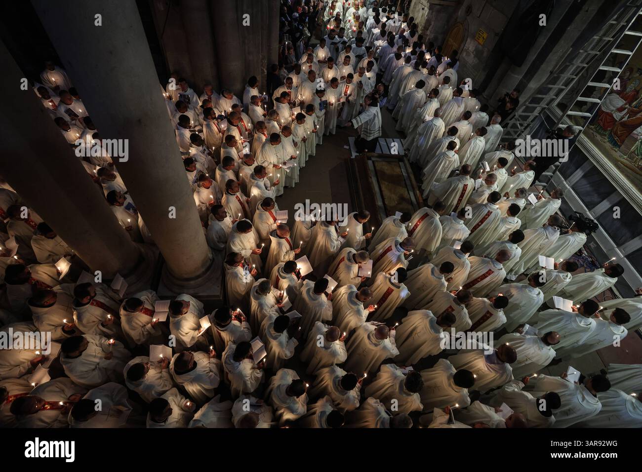 Washing of the Feet ceremony Christian monks and friars walk in procession around the Stone of ...