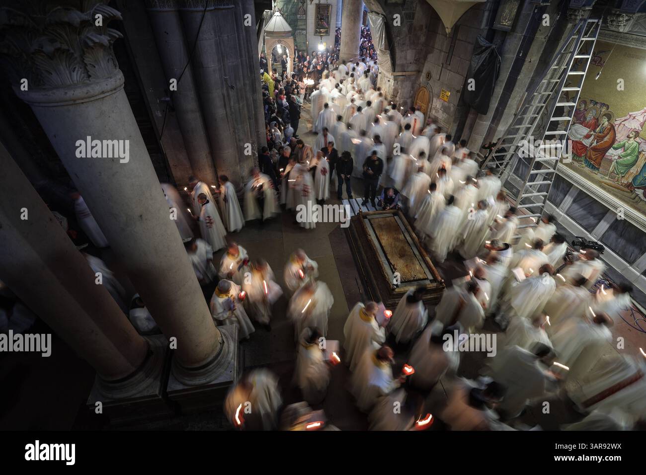 Washing of the Feet ceremony Christian monks and friars walk in procession around the Stone of ...
