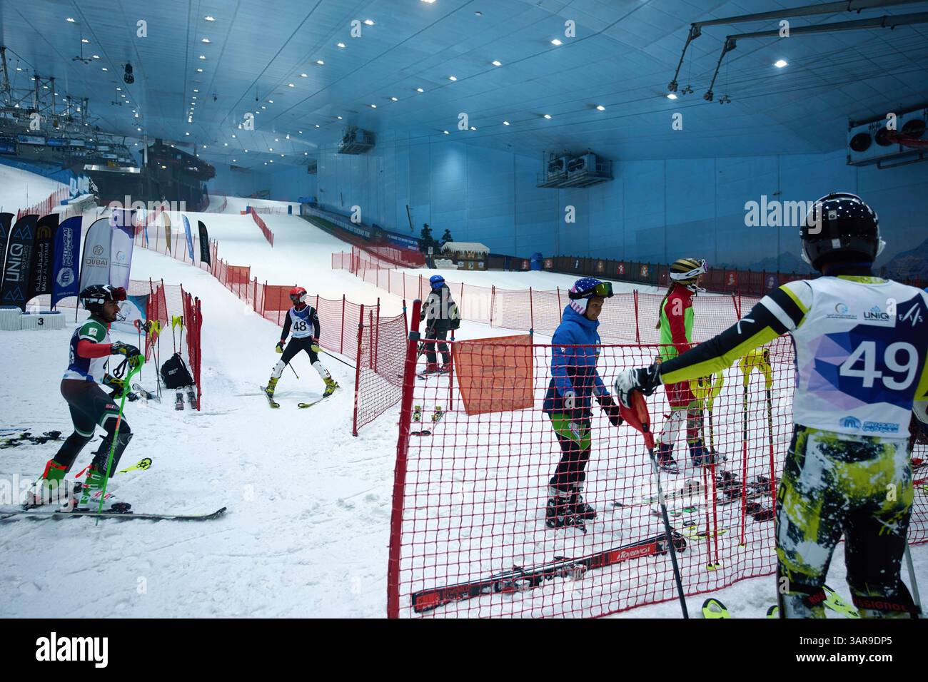 Visitors enjoy skiing at Ski Dubai, the indoor snow park located in ...