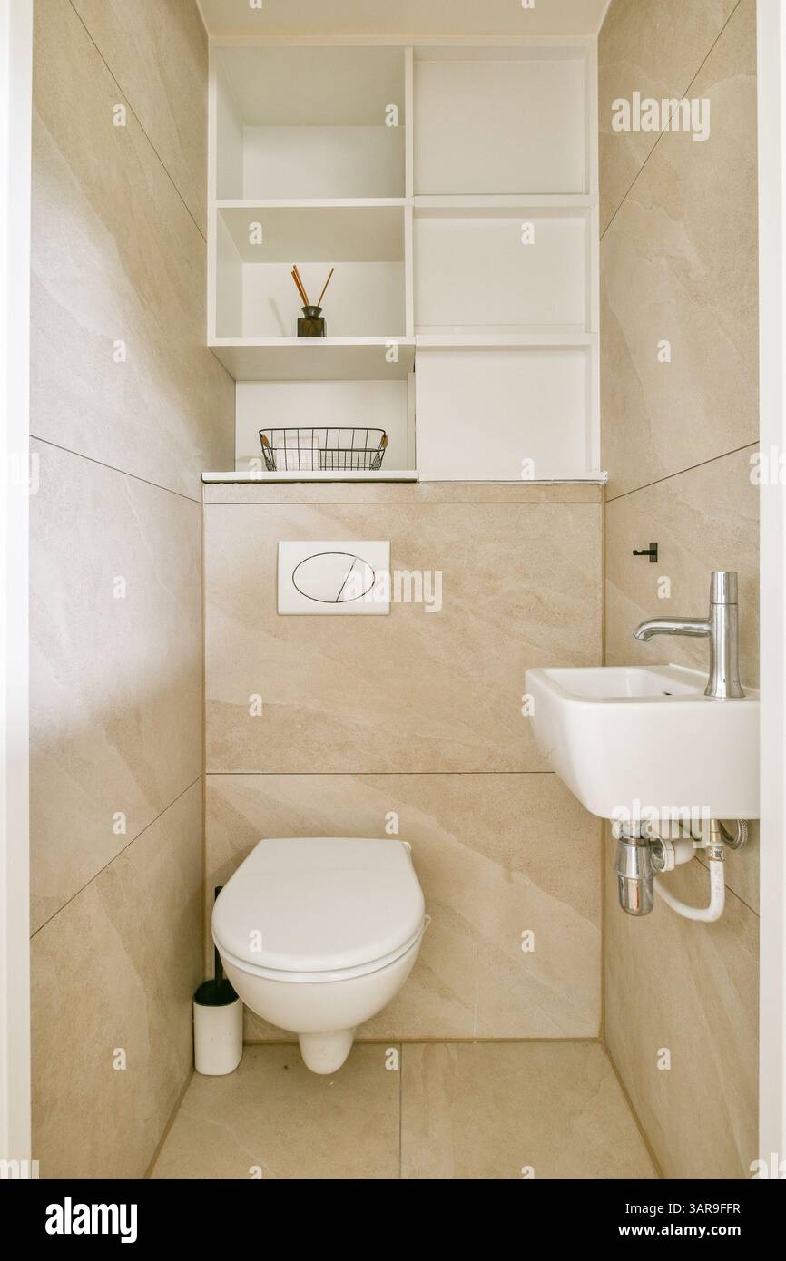 A modern small bathroom featuring minimalist design elements, with a ...