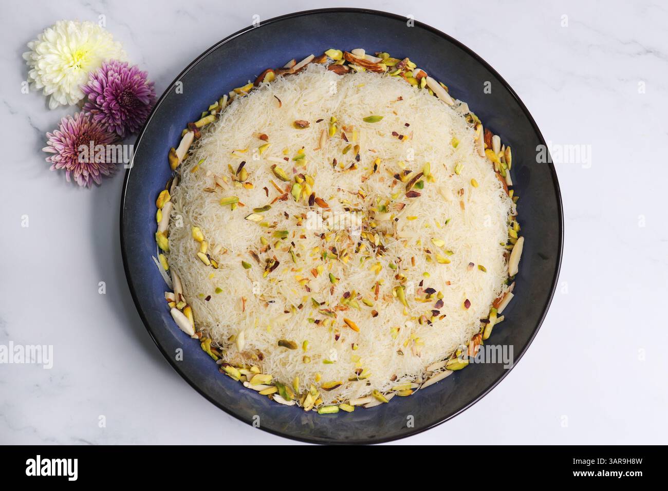 Closeup of Sutarfeni, a traditional Indian sweet made from fine sev ...