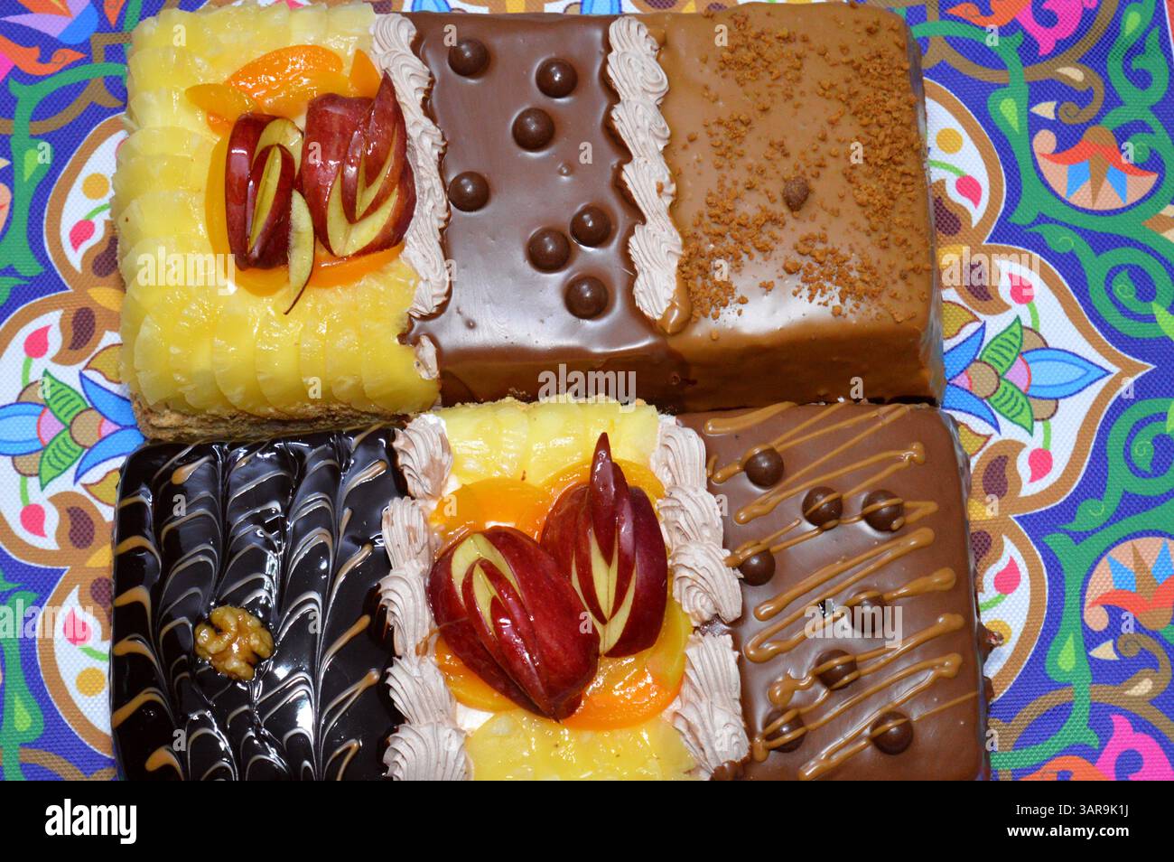 rectangular shaped birthday cake of 3 parts of different pieces sponge ...