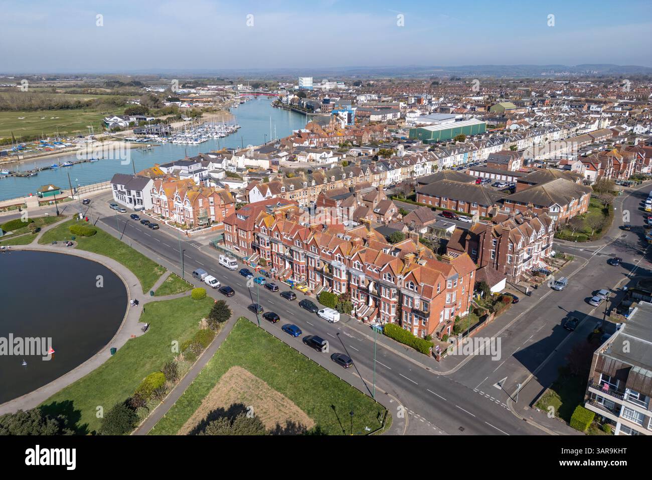 Aerial view of Oyster Pond, River Arun and seafront properties in Littlehampton (BN17) , West ...