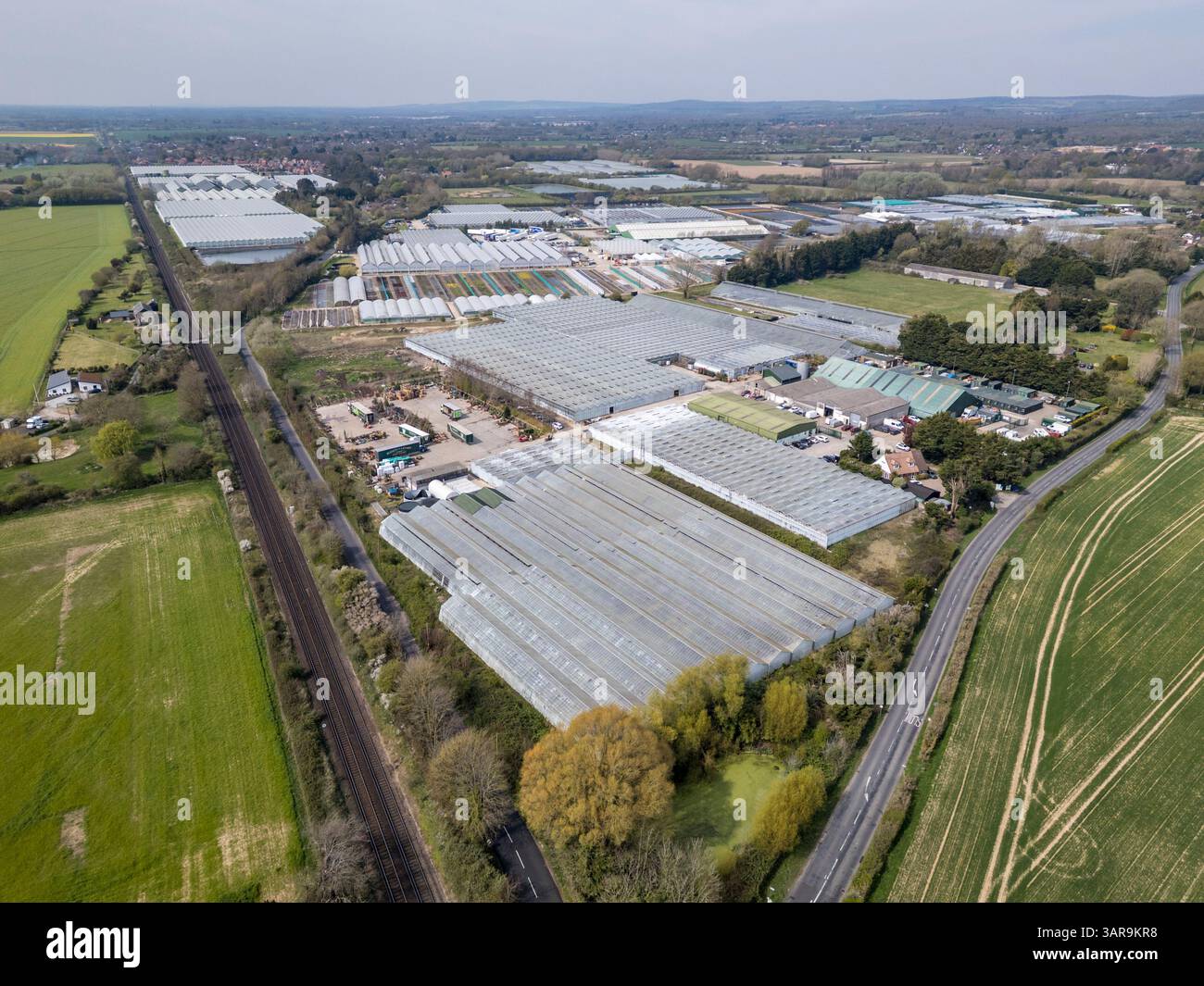 Aerial view of gardening/nursery greenhouses near Barnham, West Sussex ...