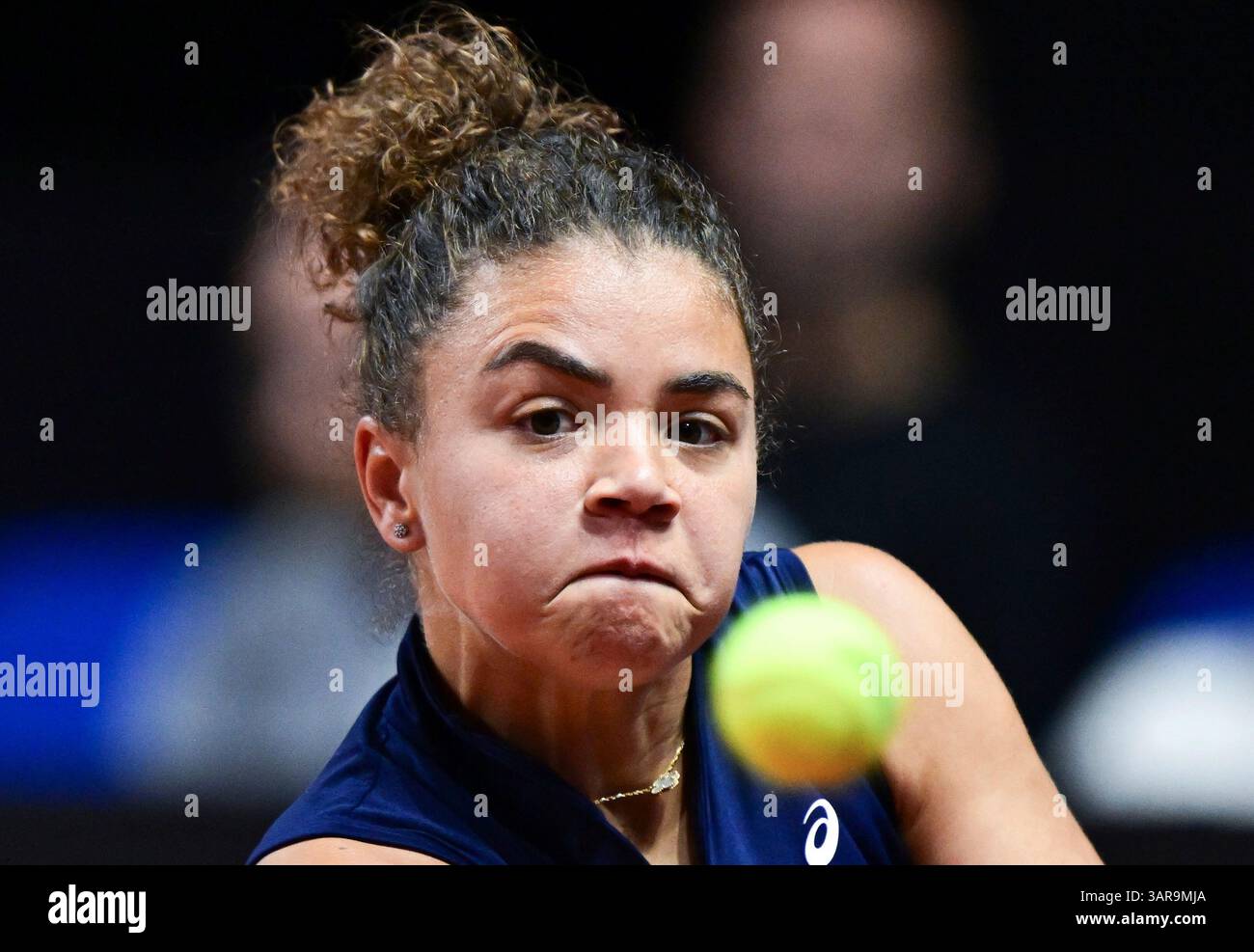 Italy's Jasmine Paolini returns a backhand to Germany's Jule Niemeier ...