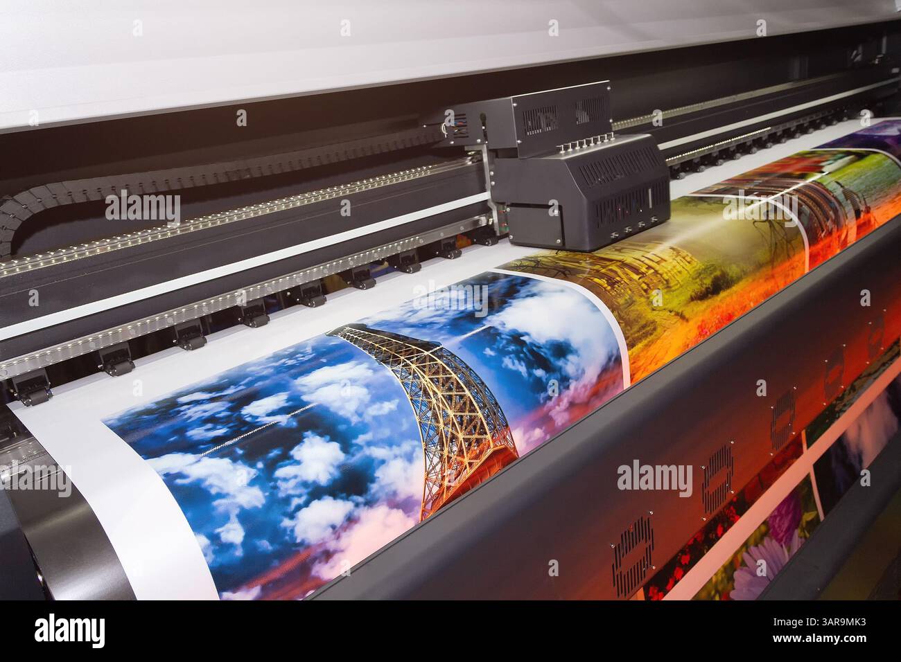 Large format printing machine in operation. Industry Stock Photo - Alamy