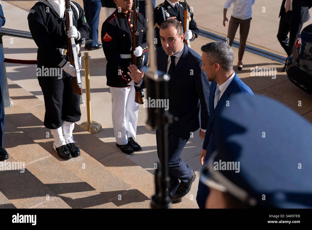 France's Minister of Armed Forces Sébastian Lecornu, center left ...