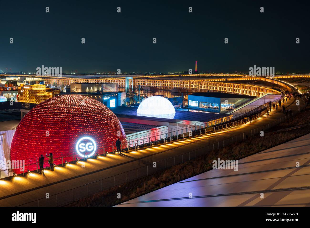 Osaka, Japan - April 16 2025 : Night view of the illuminated Grand Ring ...