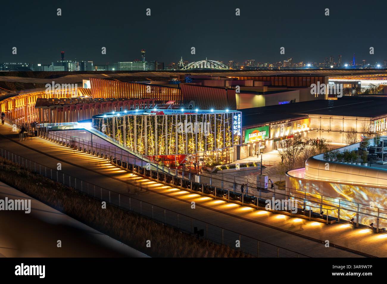 Osaka, Japan - April 16 2025 : Night view of the illuminated Grand Ring ...
