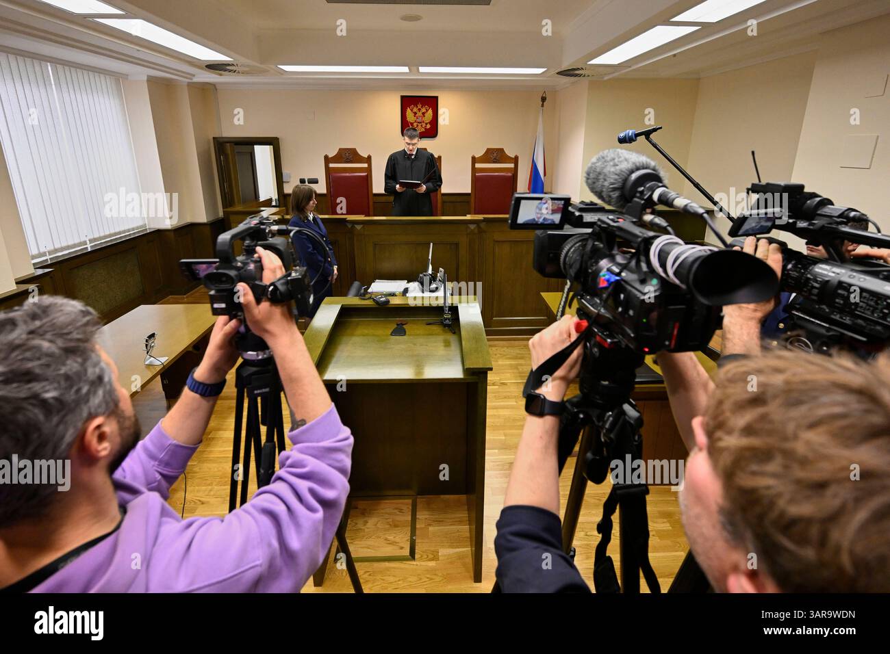 Russia's Supreme Court judge Oleg Nefyodov delivers a verdict lifting a ban on Afghanistan's ...