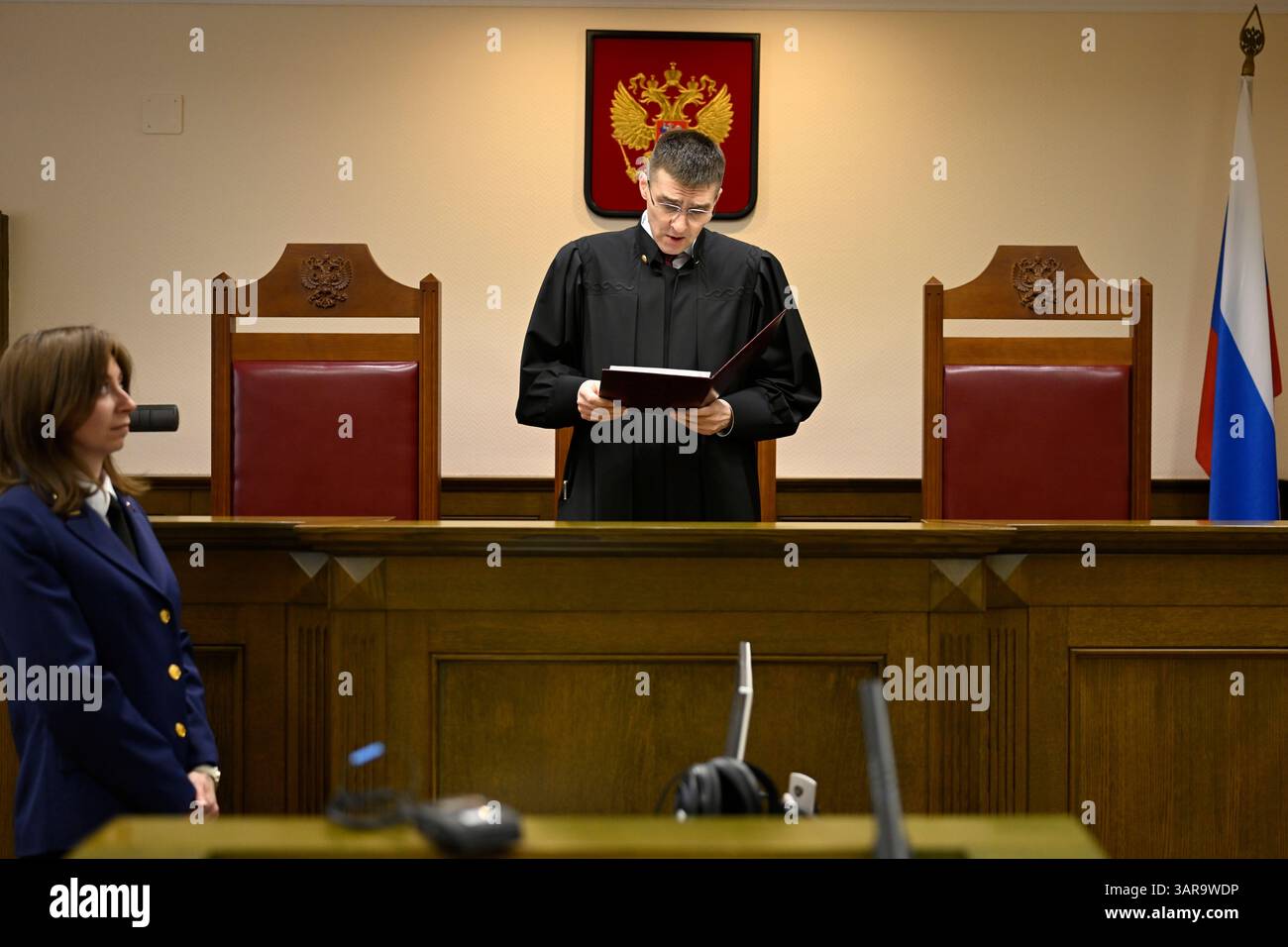 Russia's Supreme Court judge Oleg Nefyodov delivers a verdict lifting a ban on Afghanistan's ...