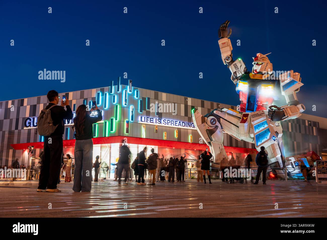 Osaka, Japan - April 16 2025 : Illuminated life-sized Gundam statue at ...