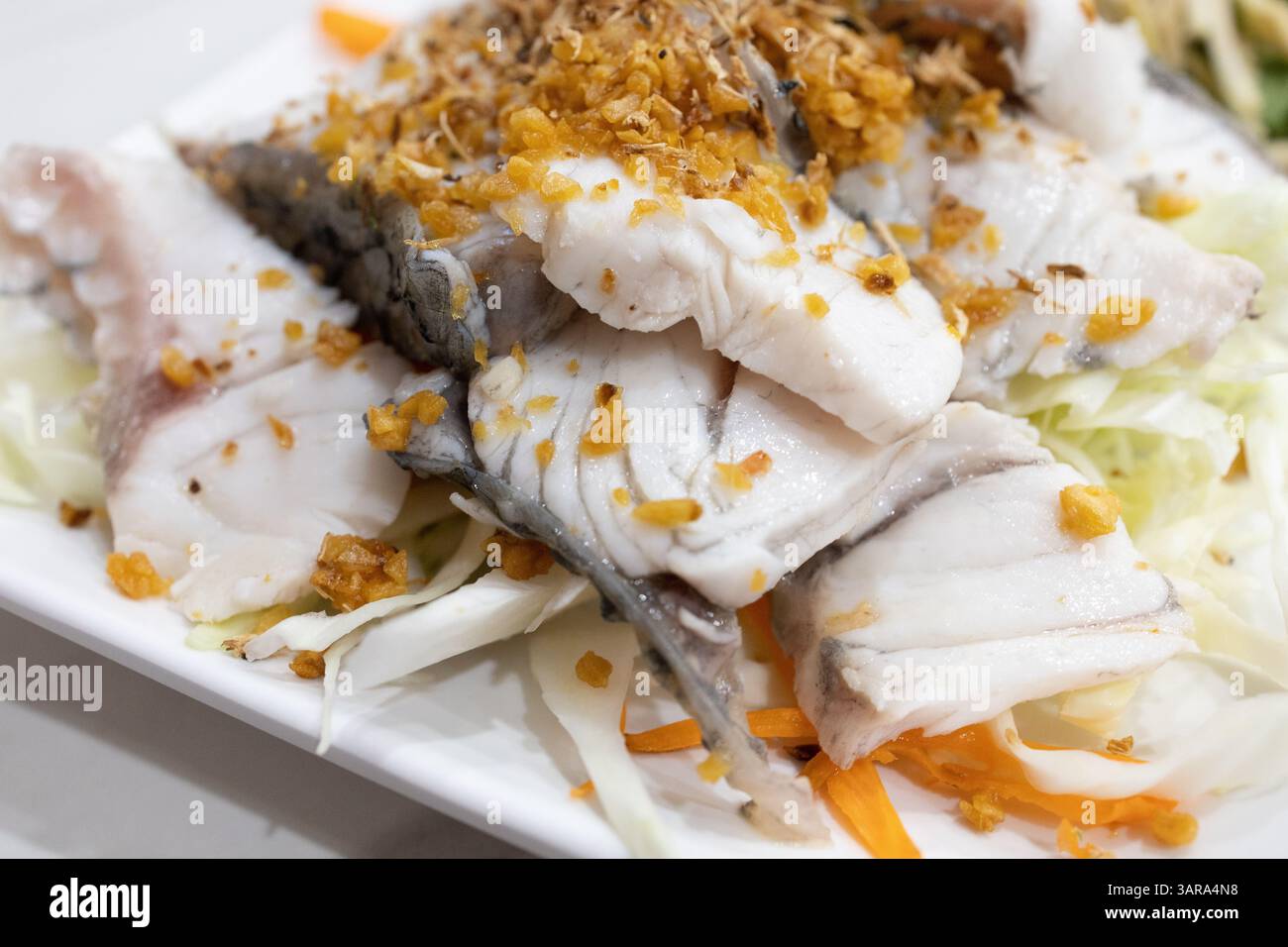 Die cut of Steam Red Snapper fillet with seafood spicy dipping on white ...