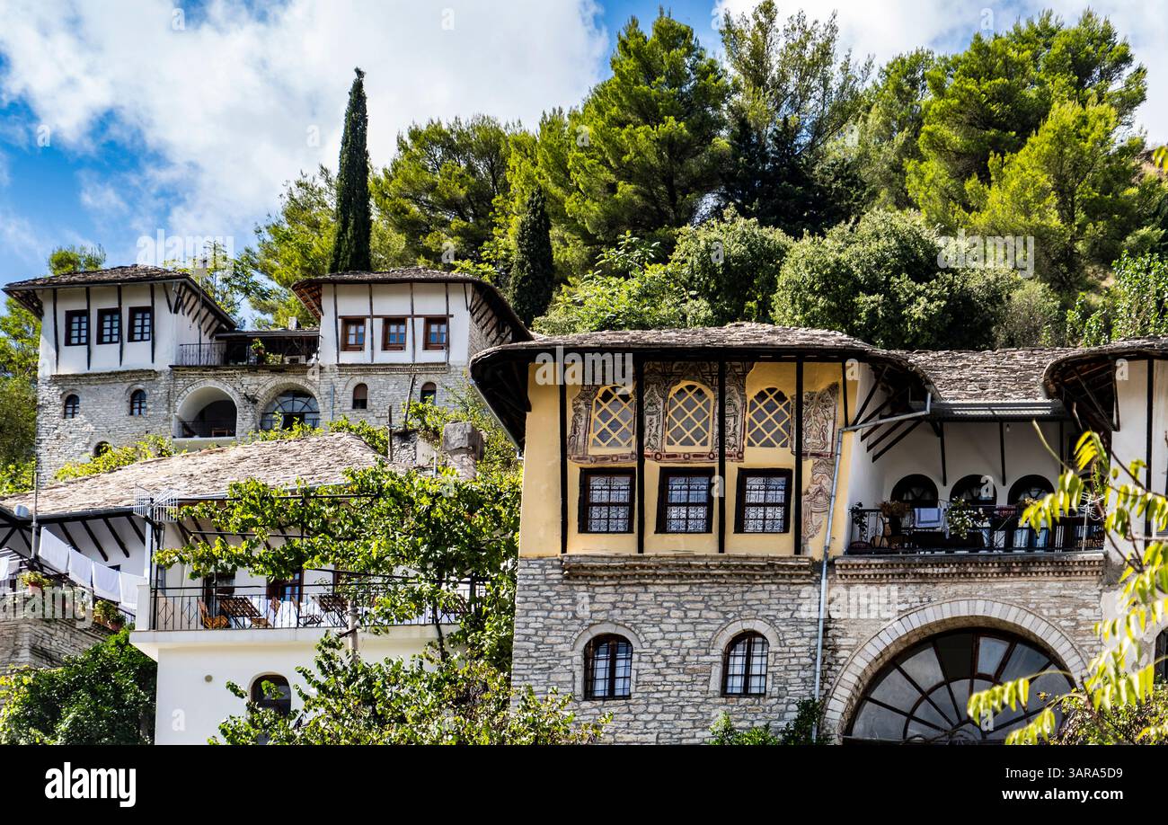 A picturesque view of traditional stone houses with wooden accents ...