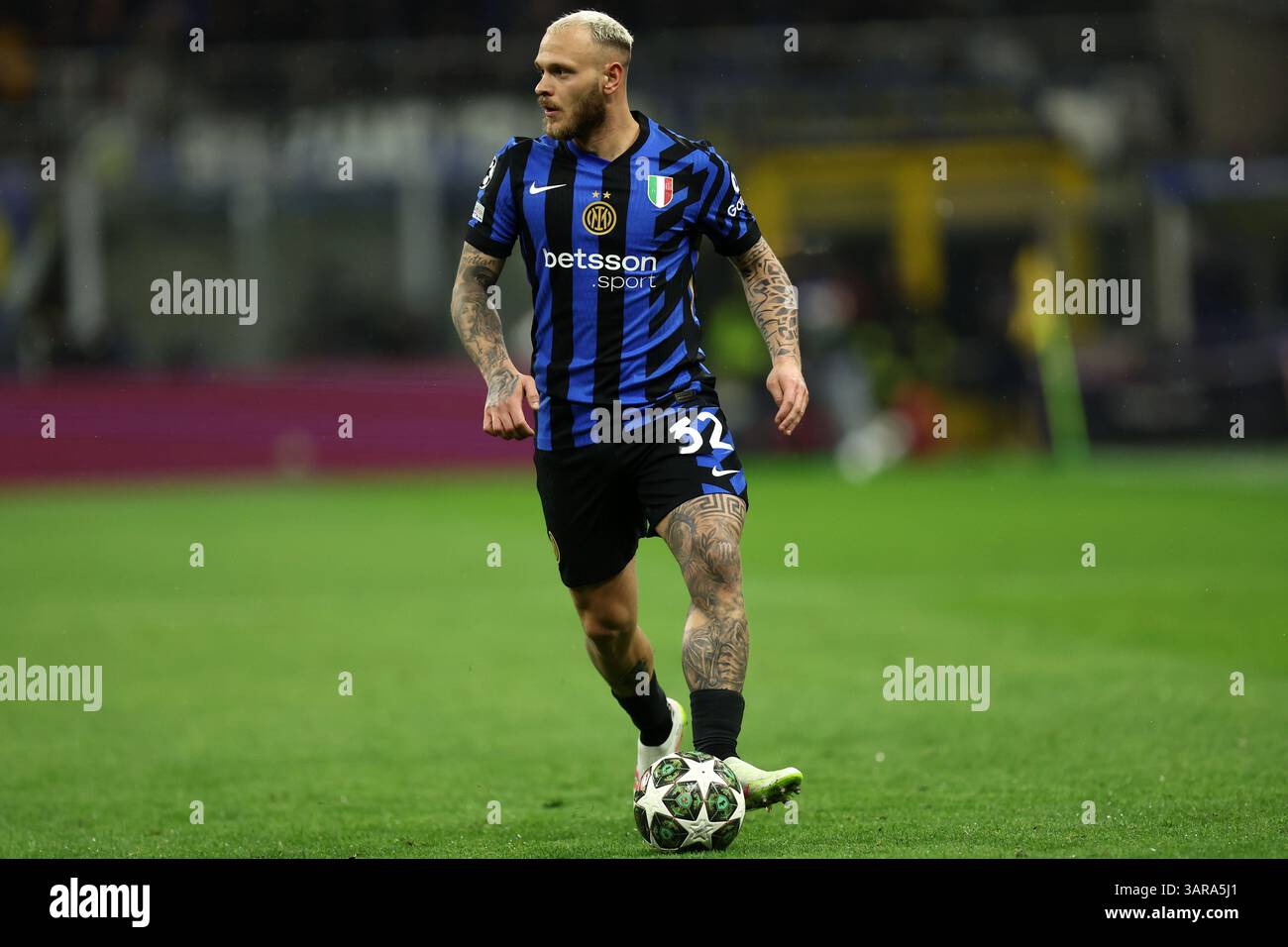 Federico Dimarco of Fc Internazionale in action during the UEFA Champions League 2024/25 quarter ...