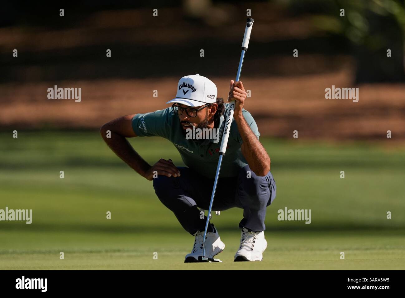 Akshay Bhatia lines up a putt on the second hole during the first round of the RBC Heritage golf ...