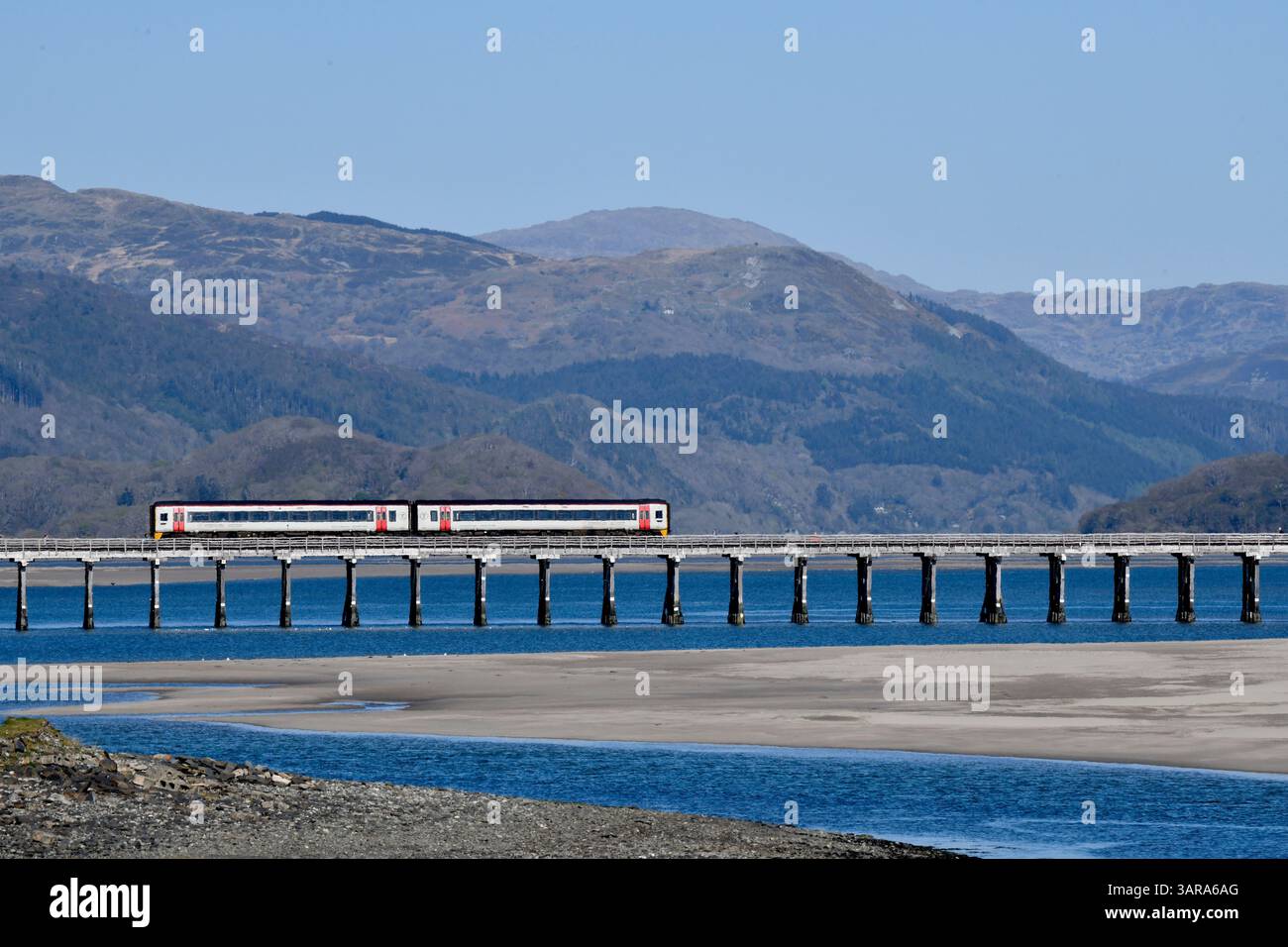 The main line Barmouth railway estuary viaduct in Wales Stock Photo - Alamy