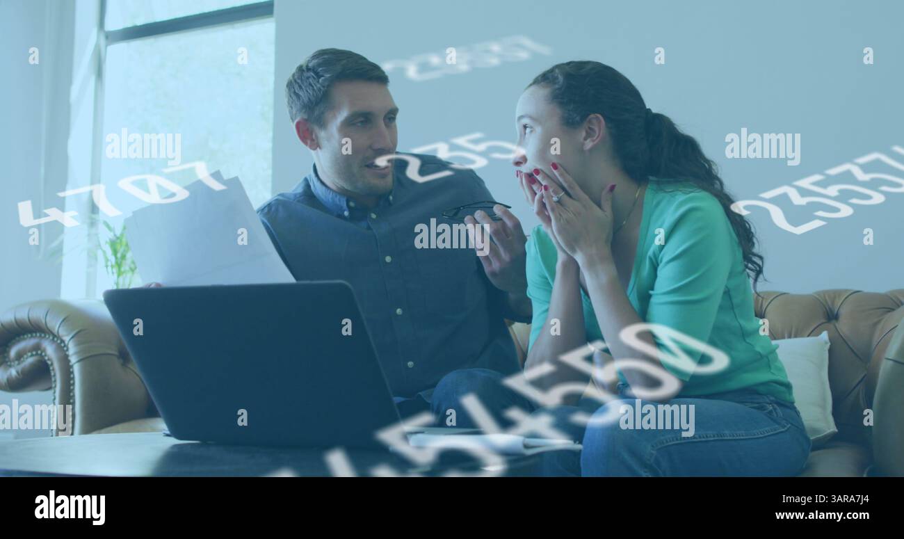 Image of numbers changing over caucasian worried woman with biracial ...