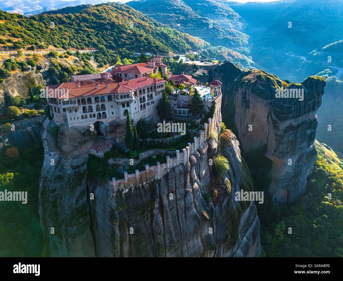 View of Meteora with Eastern Orthodox monasteries, a rock formation in ...