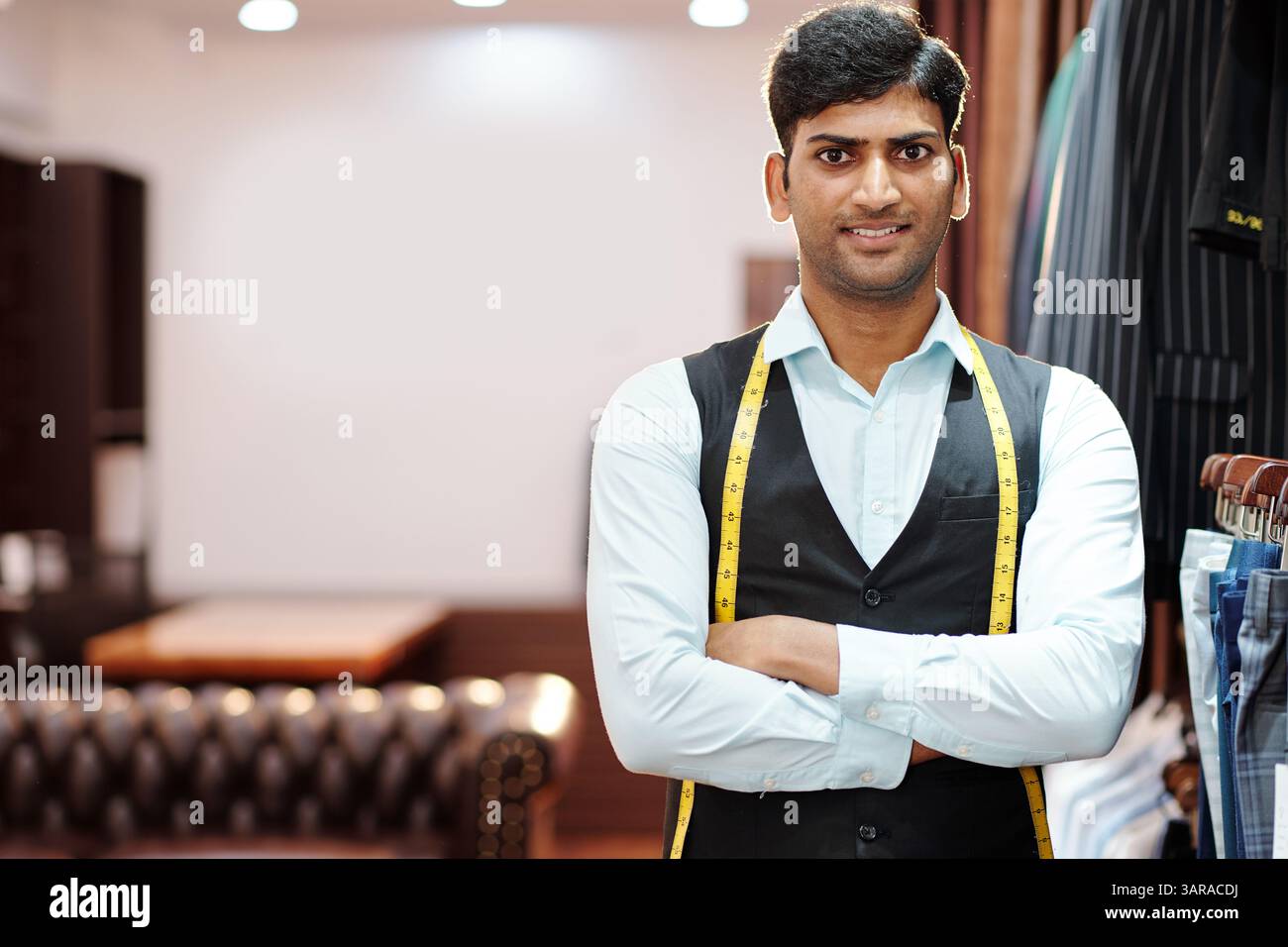 Portrait of Indian Man woking in taylor shop Stock Photo - Alamy