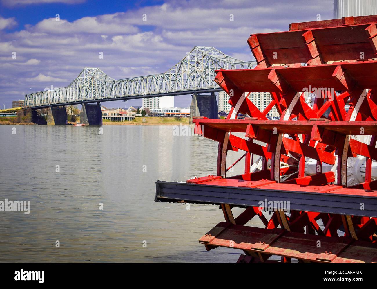 River and bridge through red paddle wheel on river boat Stock Photo - Alamy