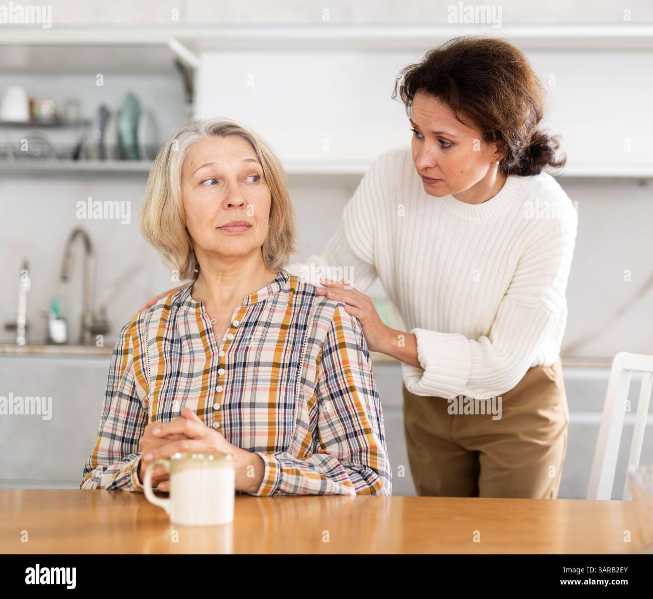 Adult daughter apologizes to her elderly mother after domestic quarrel ...