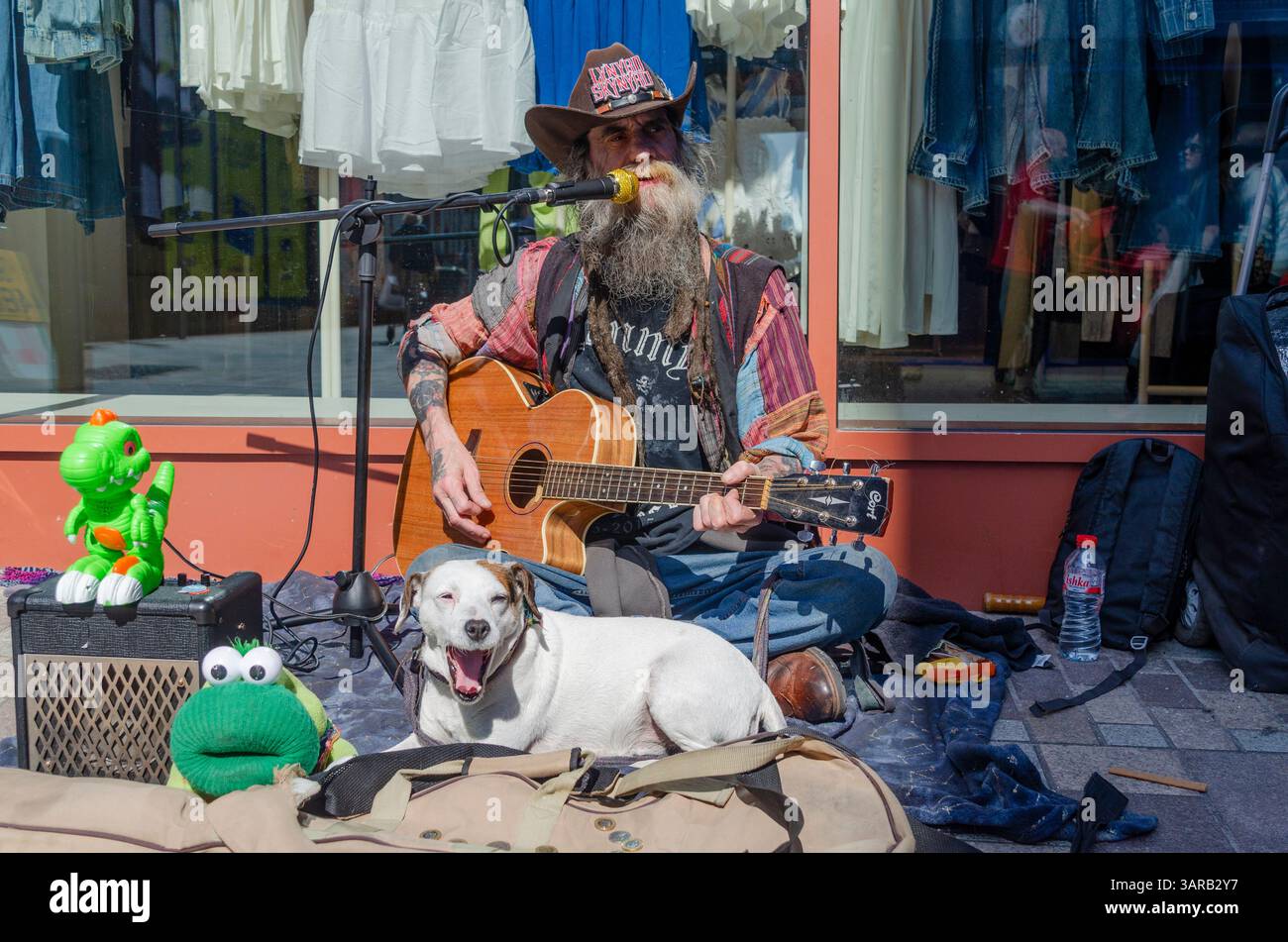 Belfast Co. Antrim Northern Ireland April 09 2025 -Mid aged busker with ...