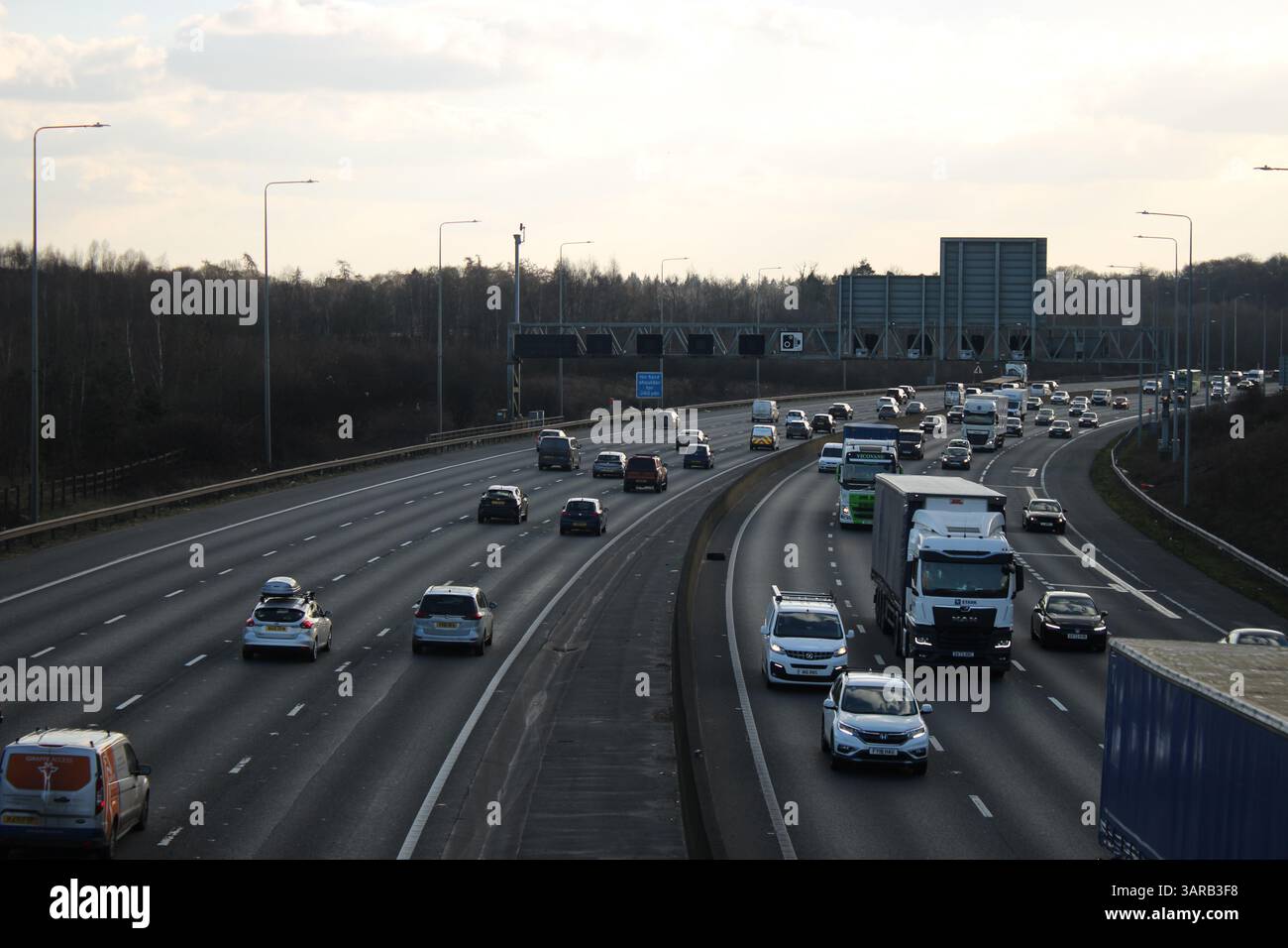 Traffic on the M25 Smart motorway travelling past Langleybury Stock ...