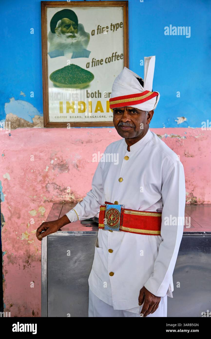 India, Karnataka, Bangalore, server at the famous Indian Coffee House ...