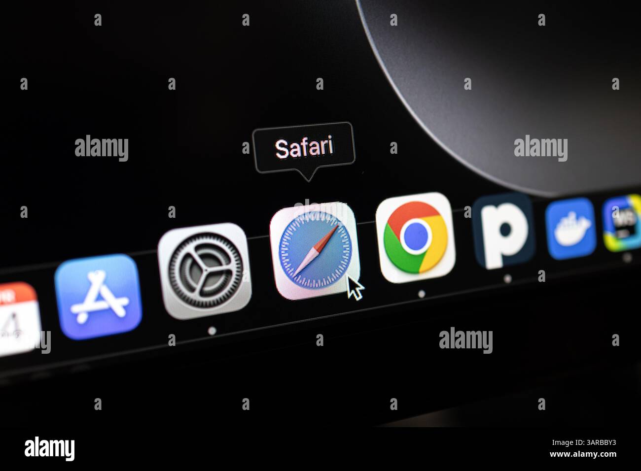 Poznan, Poland – April 14, 2025: close-up view of macOS Dock showing Safari icon under cursor ...
