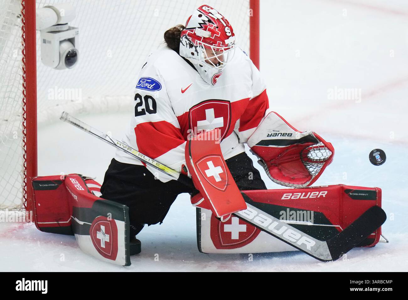Vanessa Schaefer of Switzerland makes a save during the quarterfinal ...