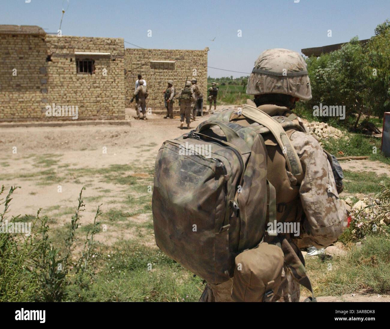 May 31, 2004; Camp Fallujah, Iraq; Distinguishable by his medical bag ...