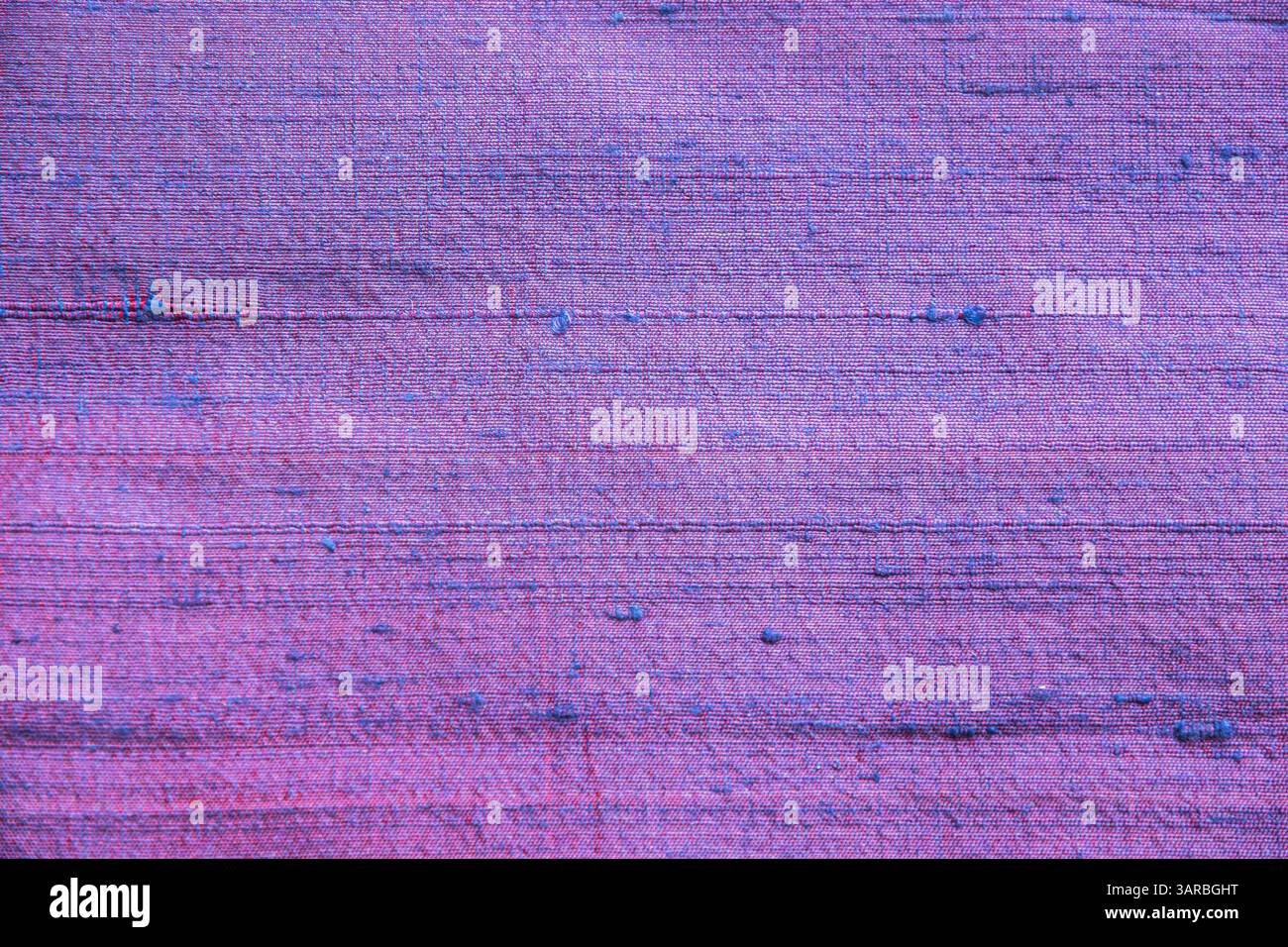 Purple shantung silk fabric texture detail closeup as textile ...