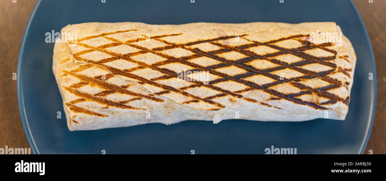 Grilled beef chicken shawarma wrap ready to eat Stock Photo - Alamy