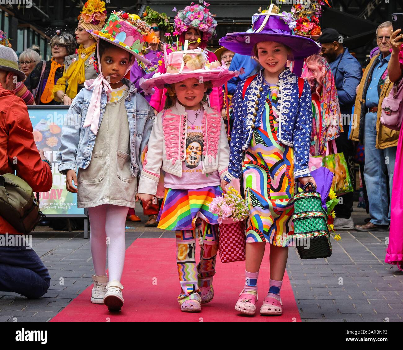 London, UK, 17th April 2025. Three little Easter Bonnet parade ...