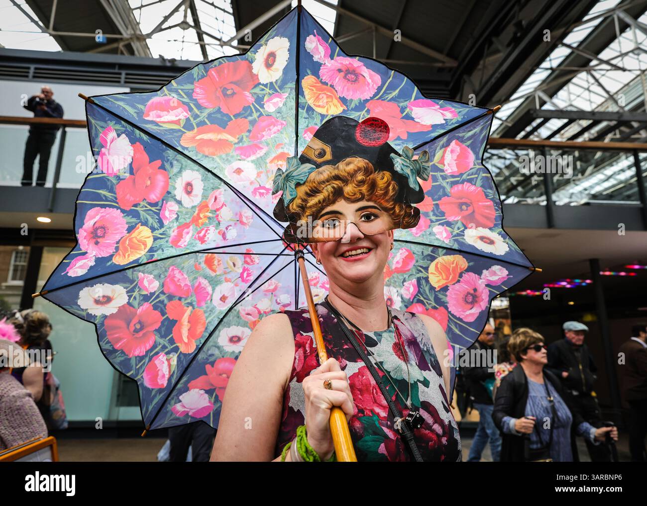 London, UK. 17th Apr, 2025. Participants show off their colourful ...