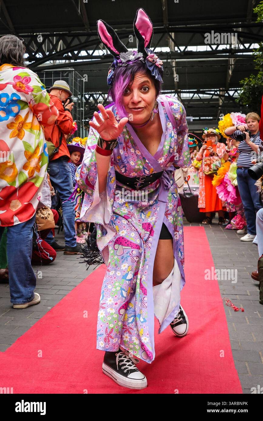 London, UK. 17th Apr, 2025. Participants show off their colourful ...
