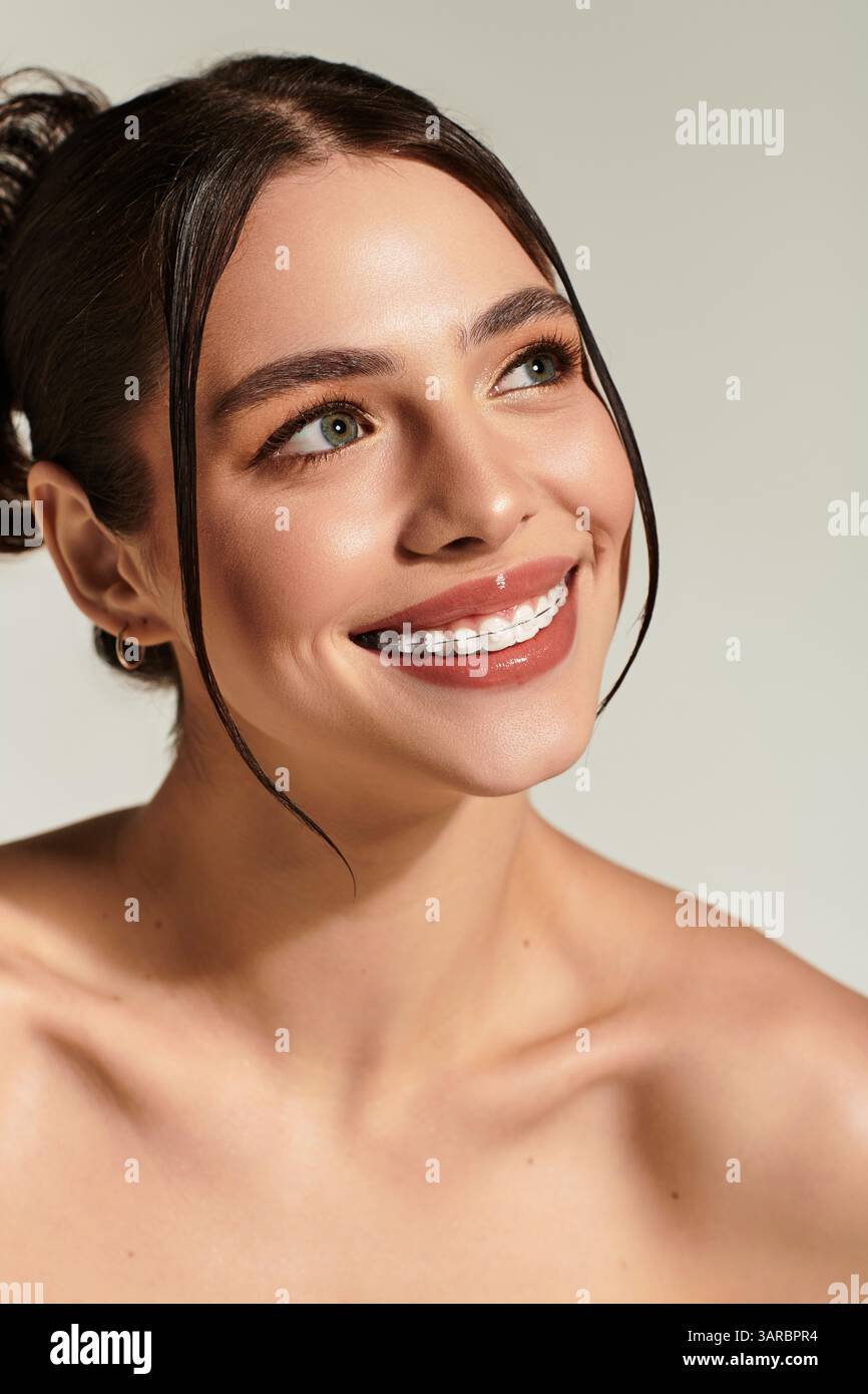 A young woman radiates joy and confidence, her braces adding to her ...