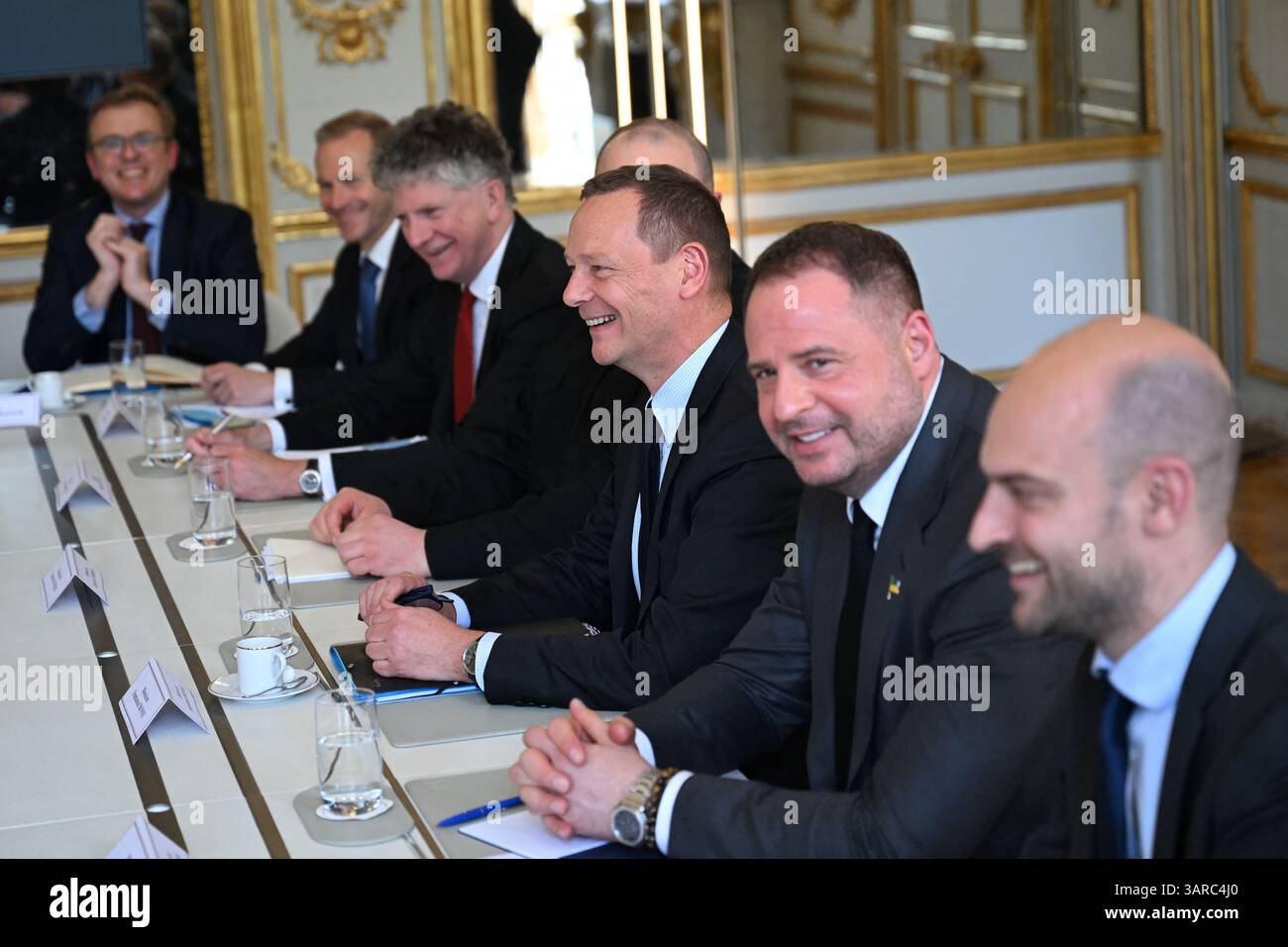 French President diplomatic advisor Emmanuel Bonne (C) with Ukrainian ...